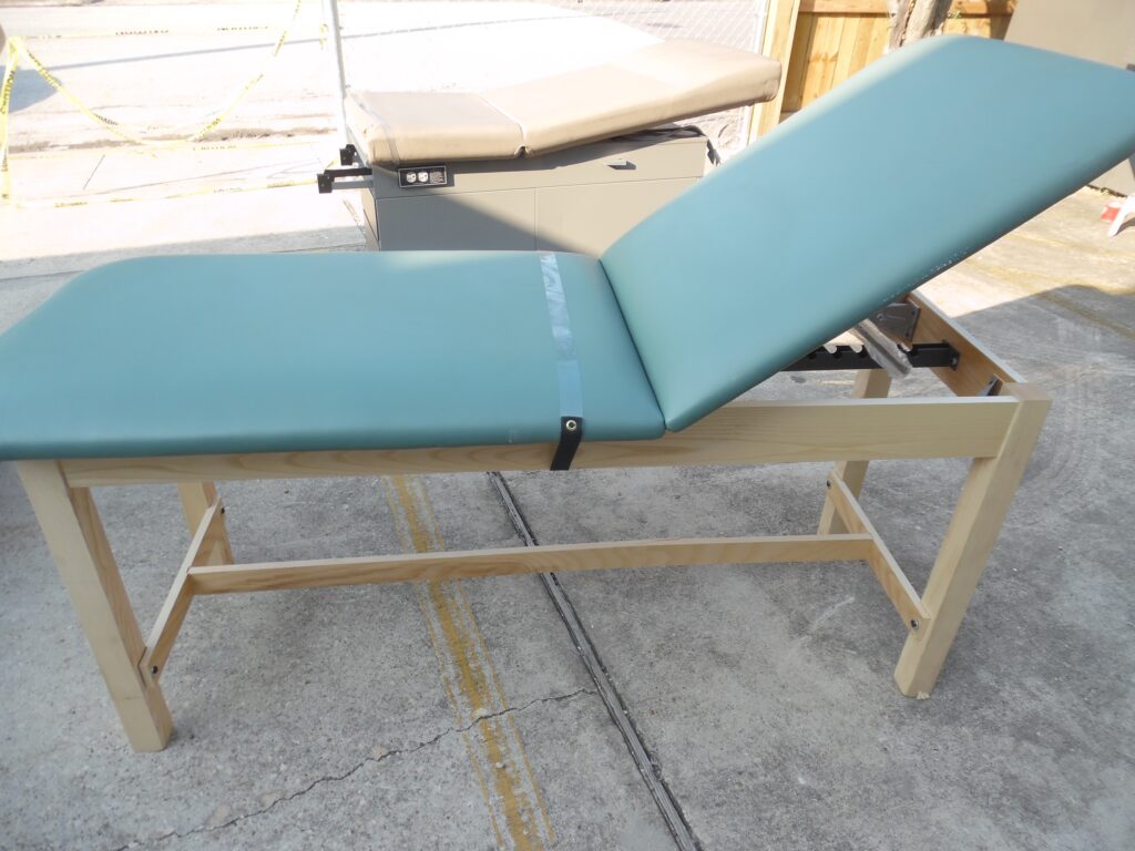 Lift-Back Treatment Table – Baxter Medical Equipment & Supplies